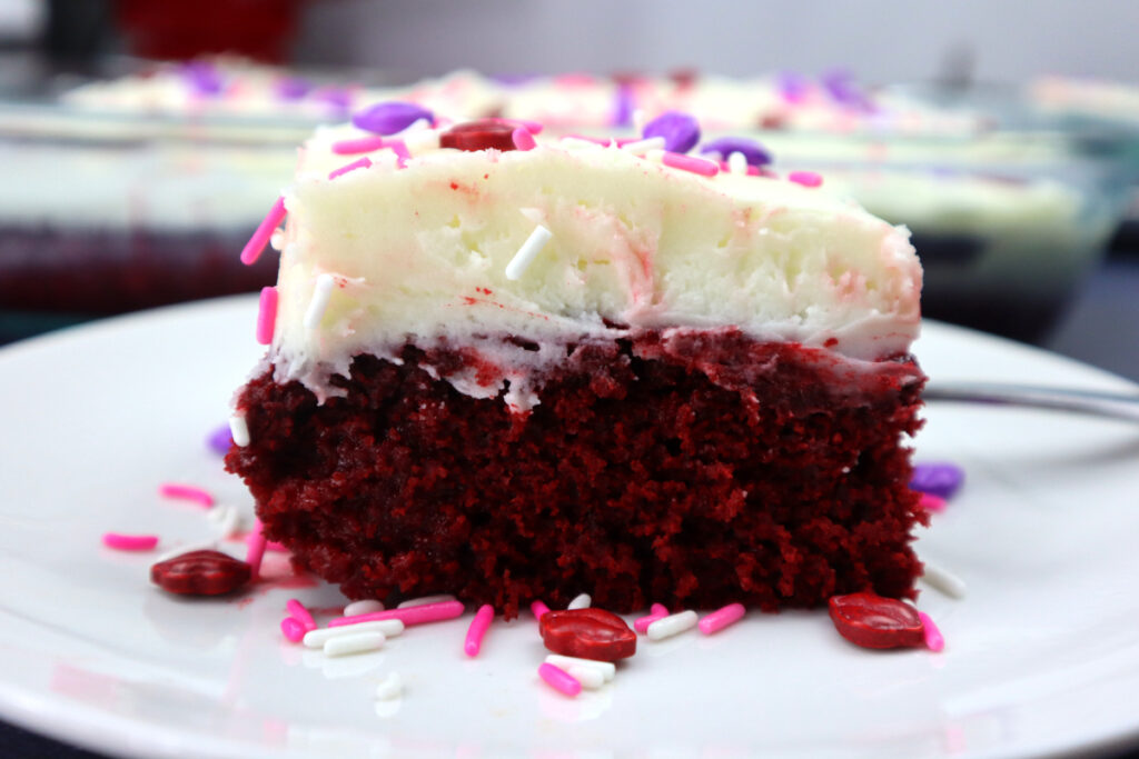 Easy Homemade Red Velvet Poke Cake Recipe - The Freckled Cook